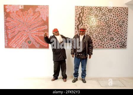 L-R SIMON HOGAN A OF THE SINIFEX PEOPLE IN AUSTRALIA IN FROUNT OF HIS ...