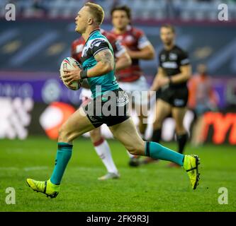 Wigan, UK. 29th Apr, 2021. Liam Farrell (12) of Wigan Warriors passes ...