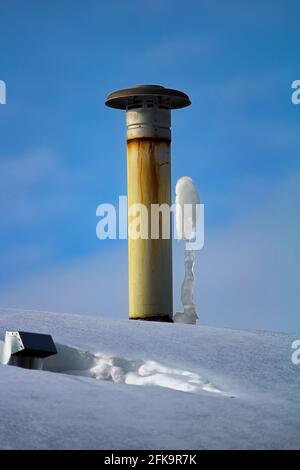 Frozen icicles beside a chimney stack in winter Stock Photo - Alamy