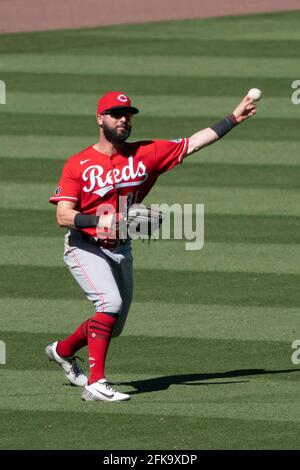 Cincinnati Reds right fielder Jesse Winker (33) and center fielder Nick ...