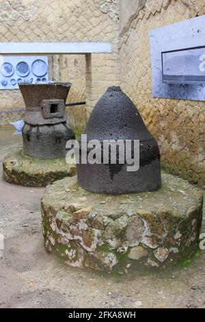 Ancient roman stone grain mill in the ruins of Pompeii Stock Photo - Alamy