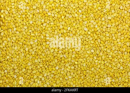 Closeup of dried Hulled and split mung bean in yellow without green ...