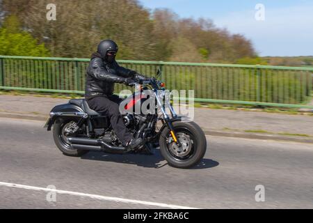 Fat man riding a motorcycle Stock Photo - Alamy