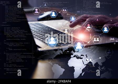front-end web developer entering programming code for website on laptop ...