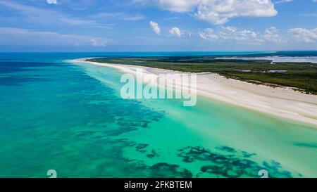 Aerial of the turquoise waters and white sands of Holbox island ...