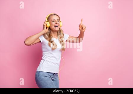 Profile photo of positive lovely girl hanging ball toys decorate ...