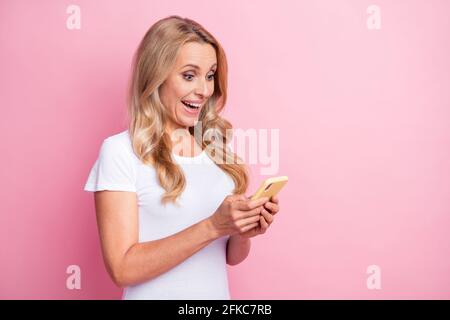 Photo of adorable impressed lady wear violet t-shirt playing ...