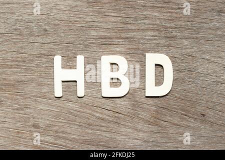 Wood letter in word HBD (Abbreviation of happy birthday) on artificial ...