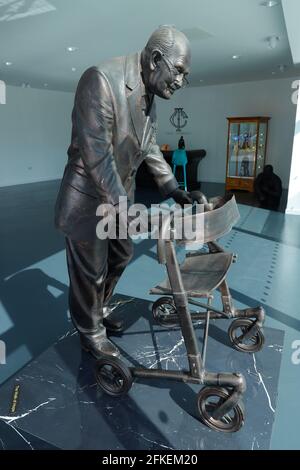 A resin statue of the late Sir Captain Tom Moore on display at Clark ...