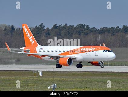 A passenger aircraft departing from Berlin Brandenburg Airport BER is ...