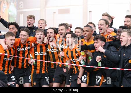 Hull City players celebrate outside the KCOM Stadium in front of the waiting fans Stock Photo ...