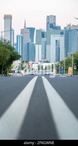 The skyline of Doha, Qatar before sunset Stock Photo - Alamy