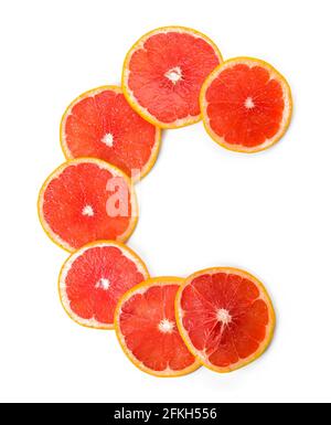 Letter C made with citrus fruits on pink background as vitamin ...