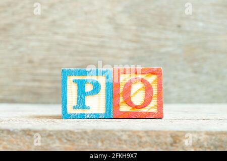 Alphabet letter in word PO (Abbreviation of purchase order) on wood ...