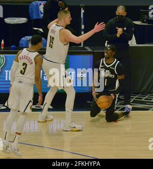 Denver Nuggets guard Reggie Jackson pushes past Miami Heat guard Terry ...