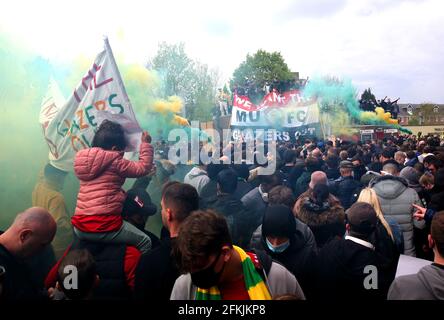 Fans holds up banners as they protest against the Glazer family, owners ...
