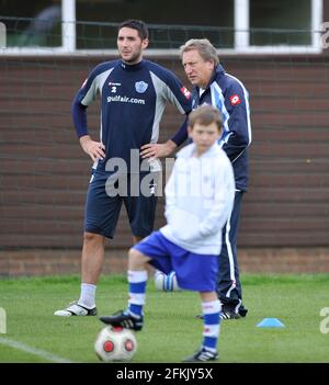 SHAUN DERRY of QPR. MANAGER NEIL WARNOCK DURING TRAINING WITH HIS SON ...