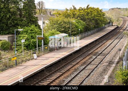 Pencoed, near Bridgend, Wales - April 2021: Red warning lights flashing as a high speed train ...