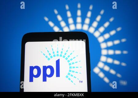 In this photo illustration the PPL Corporation logo seen displayed on a ...