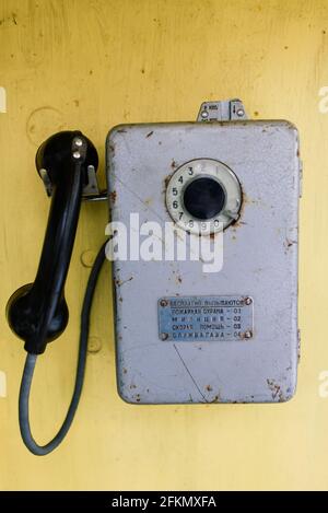 Vintage yellow german phone box Stock Photo - Alamy