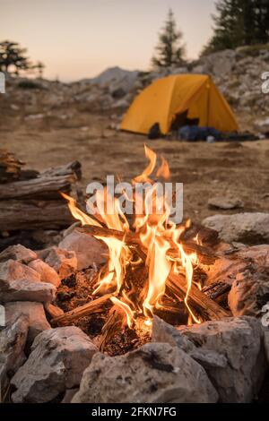 Campfire and Tent in Mountains. Leisure Activity Outdoors Stock Photo ...