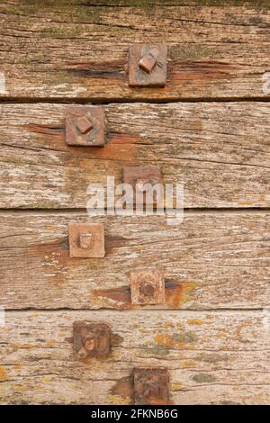 detail of rustic wooden sea defences and groyne at Crosby Beach ...