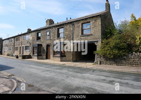 Housing in the Calderdale hill village of Midgley, West Yorkshire ...