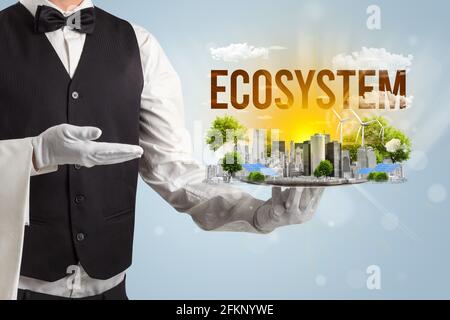 Waiter serving eco cityscape concept Stock Photo - Alamy