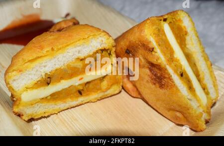 Indian or Pakistani Bread pakoda with stuffed potato curry and Paneer ...