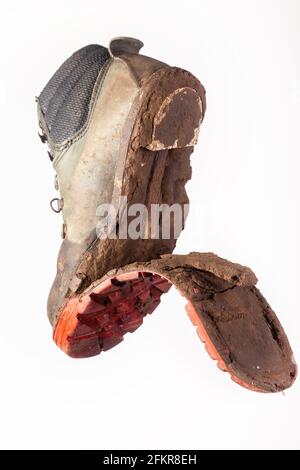 An old boot with the sole coming off Stock Photo - Alamy