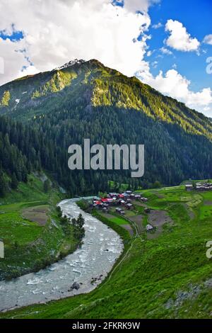 Mesmerizing views of the green landscapes and a river against the ...