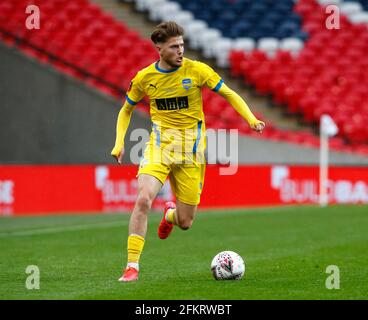L-R Lewis Simper of Concord Rangers (on loan from Cambridge United) and ...