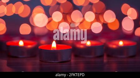 Burning candles in night. Festive Christmas background Stock Photo - Alamy