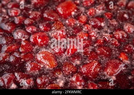 Strawberry jam is boiling, detailed shooting Stock Photo - Alamy