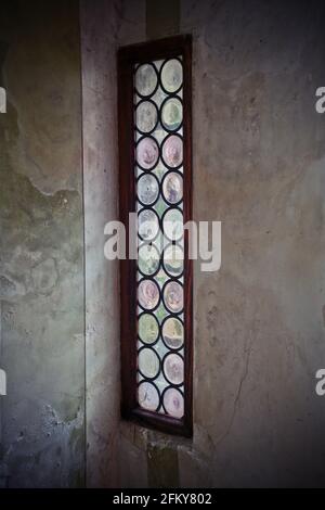 Typical ancient Venetian colored windows Stock Photo - Alamy