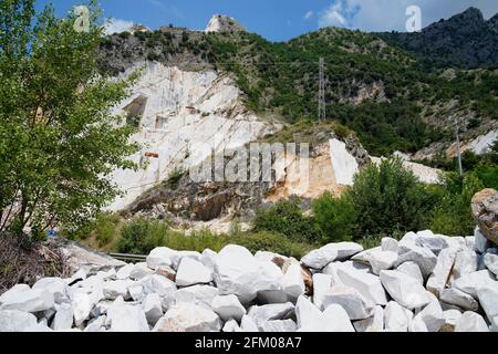 Terraced rock face in open pit Carrara marble mines or quarries ...