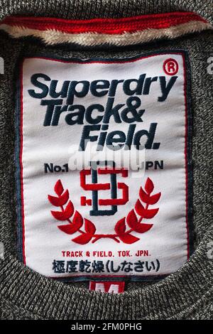 Superdry Track & Field label in clothing - Superdry clothes logo symbol ...