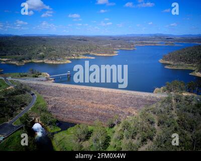 Aerial of Fred Haigh Dam wall which contains Lake Monduran near Gin Gin ...
