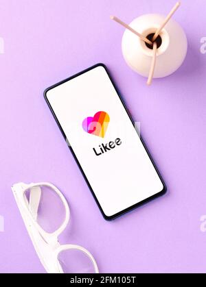 Smartphone with Likee short video sharing service logo on screen in ...