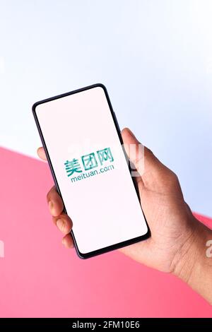 The logo of Meituan, a Chinese shopping app for consumer items ...