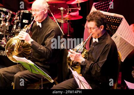 The French Horn section of the orchestra in performance Stock Photo - Alamy