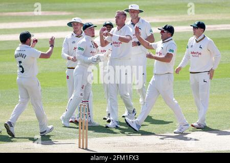 Stuart Broad of Notts celebrates with his team mates after taking the ...