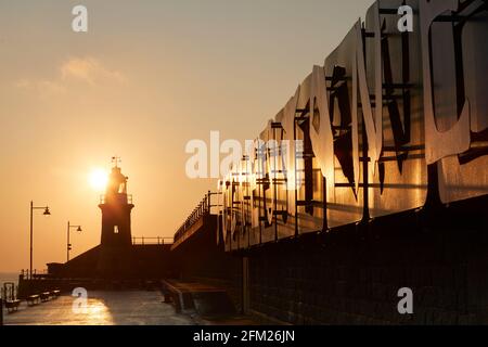 Sunrise over the Harbour Arm, Folkestone, Kent, England Stock Photo - Alamy