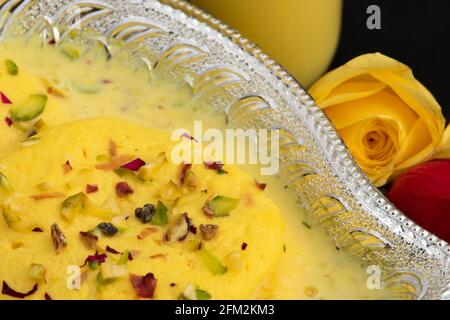 RASMALAI, AN INDIAN DESSERT MADE FROM COTTAGE CHEESE SOAKED IN SWEET ...