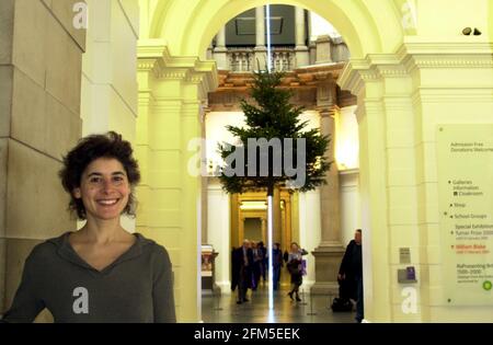 Christmas tree 2000, at Tate Britain. With the artist in the foreground ...