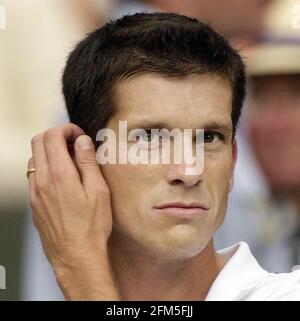 WIMBLEDON 11TH DAY 5/7/2002 TIM HENMAN OFF FOR RAIN PICTURE DAVID ...