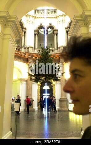 Christmas tree 2000, at Tate Britain. With the artist in the foreground ...