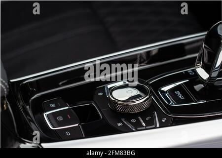 Gear shift controller in new luxurious car interior. Modern car ...