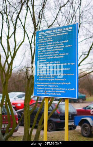 POZNAN, POLAND - Jan 30, 2016: Two years old child sitting in a play ...