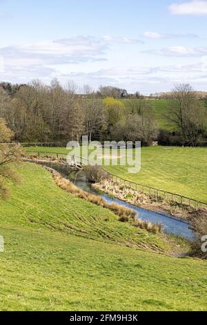 The valley of the infant River Leach between the Cotswold villages of ...